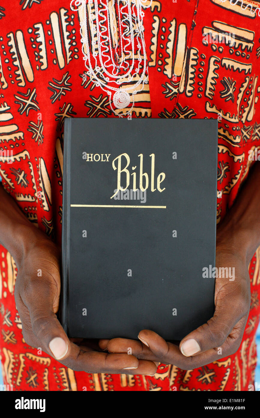African man reading the bible Stock Photo - Alamy