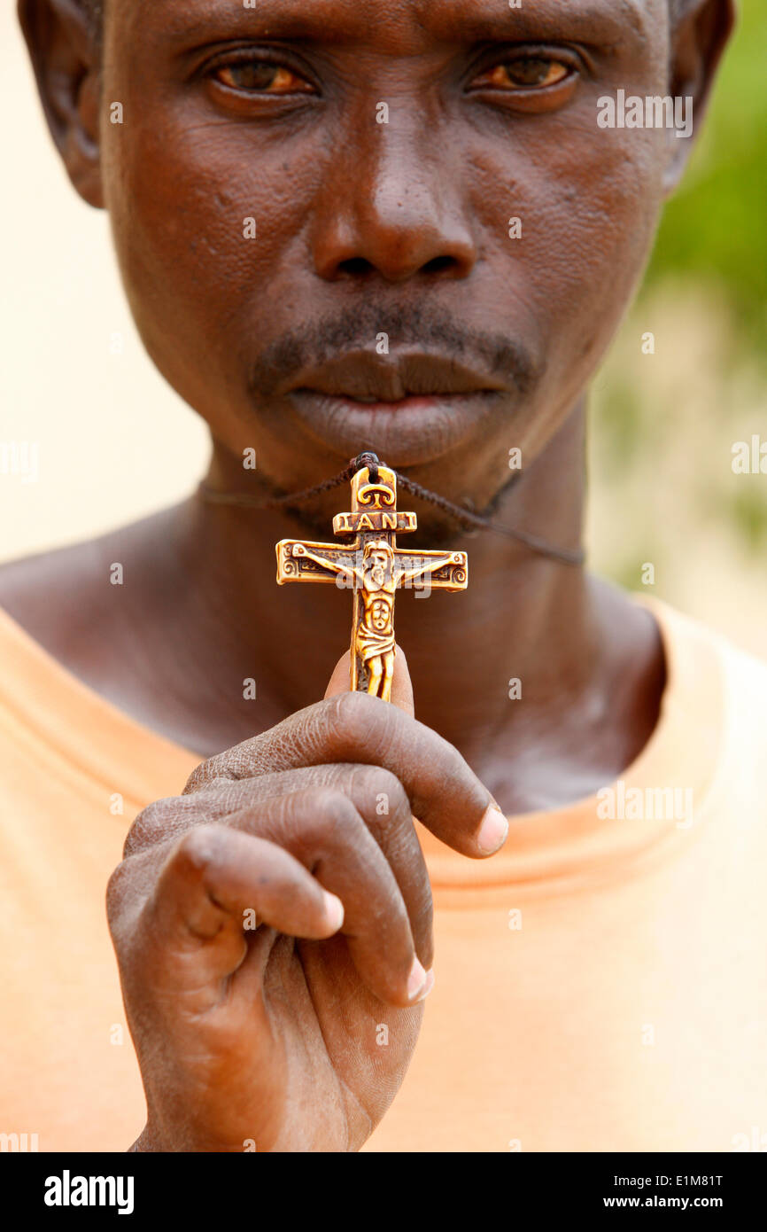 Catholic man and his crucifix Stock Photo - Alamy