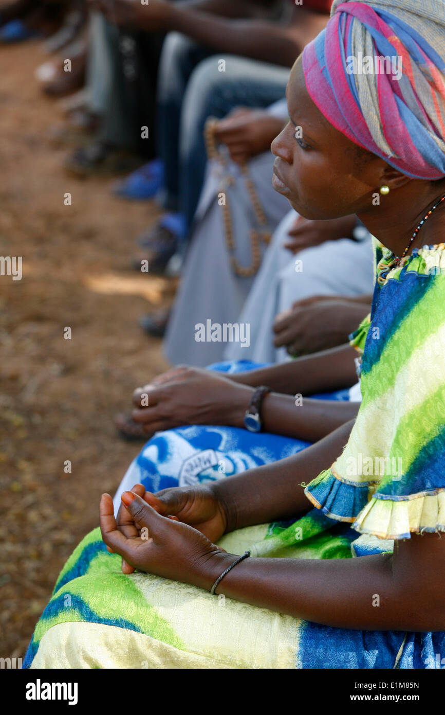 Group of praying Africans Stock Photo - Alamy