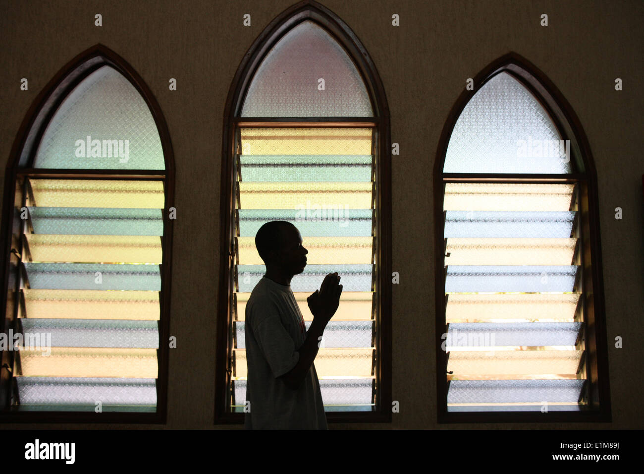 Prayer in church Stock Photo - Alamy