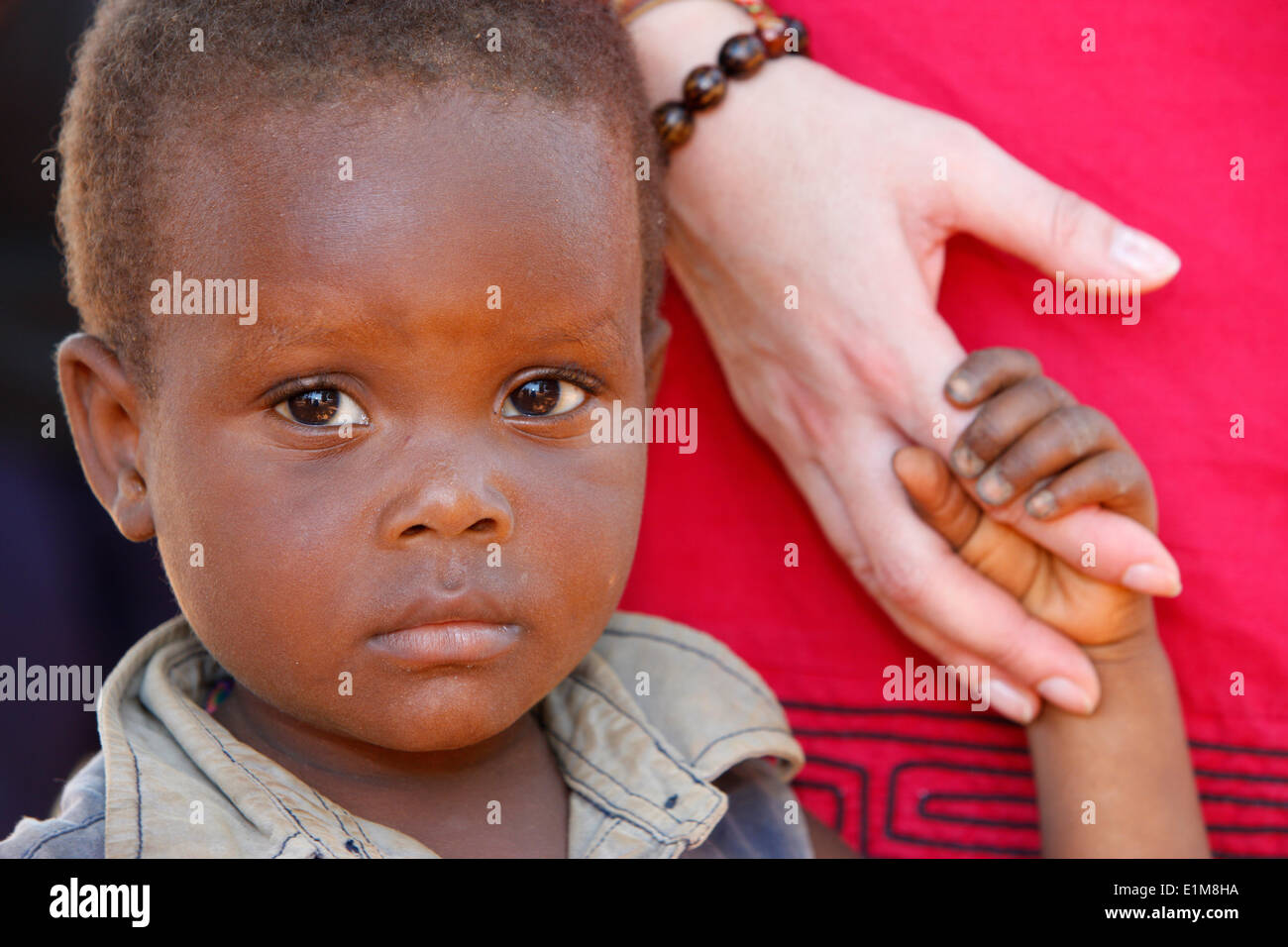 White woman black child orphan hi-res stock photography and images - Alamy