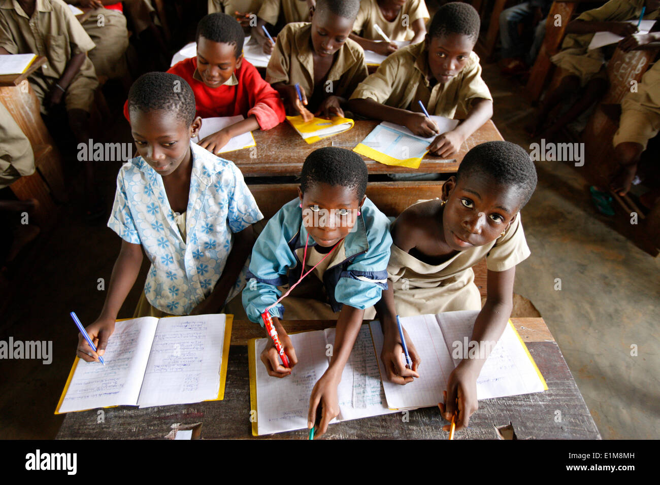 African school child in school writing hi-res stock photography and ...