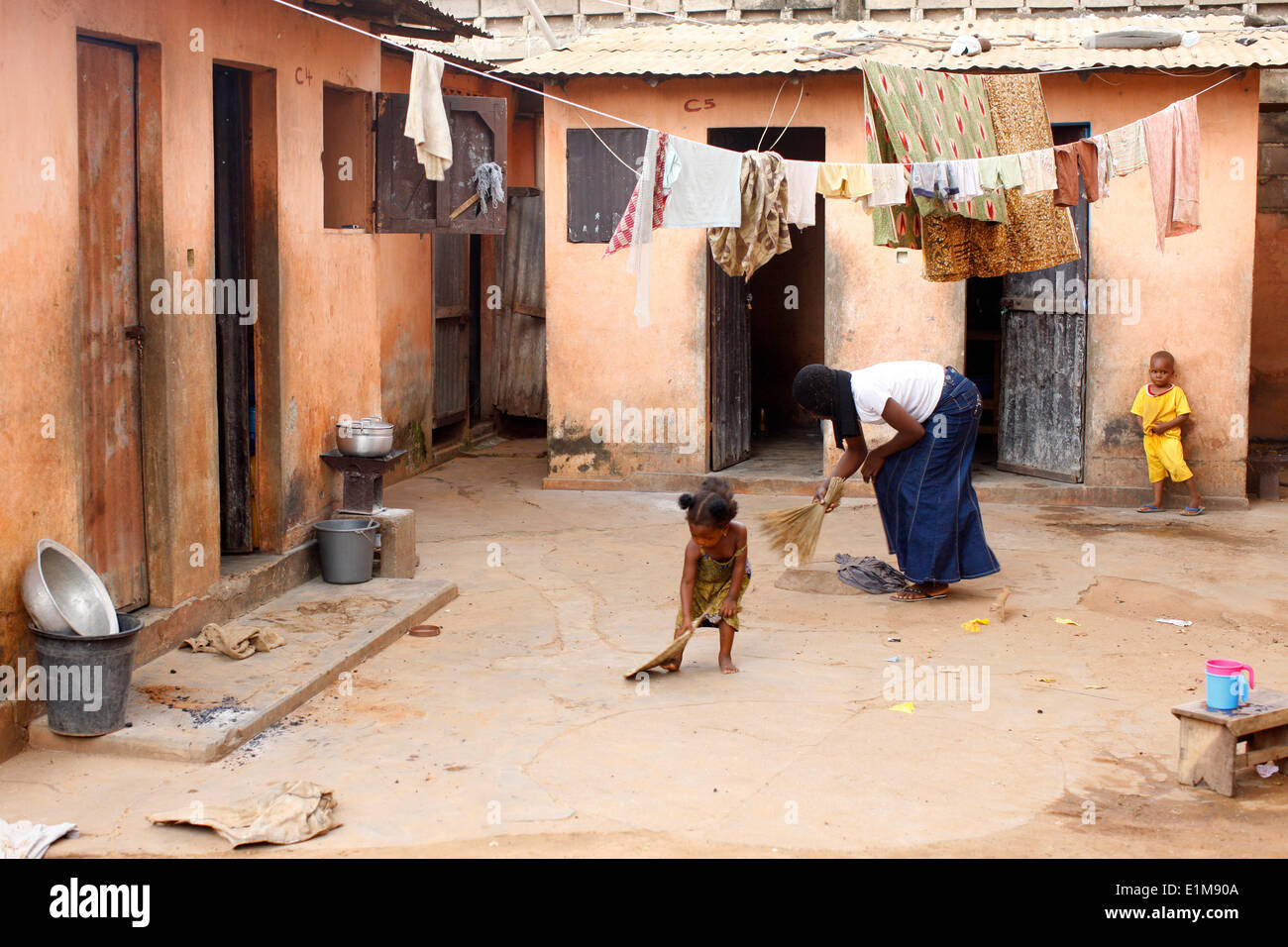 Woman cleaning home africa hi-res stock photography and images - Alamy