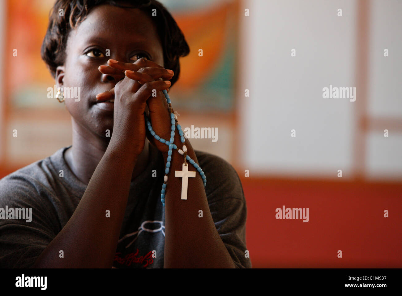 Christian woman praying Stock Photo - Alamy