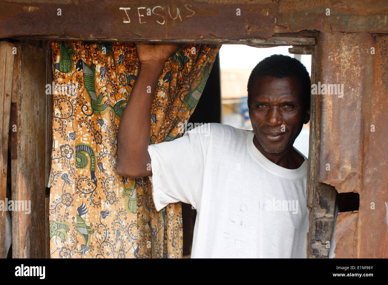 African man living in a rundown district Stock Photo - Alamy