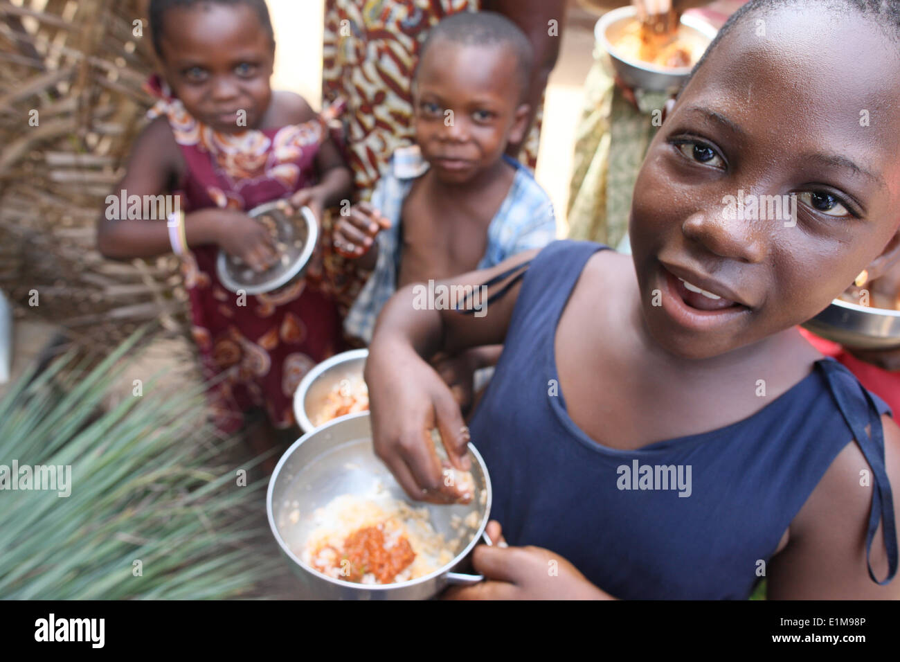 Children eating an African meal Stock Photo - Alamy