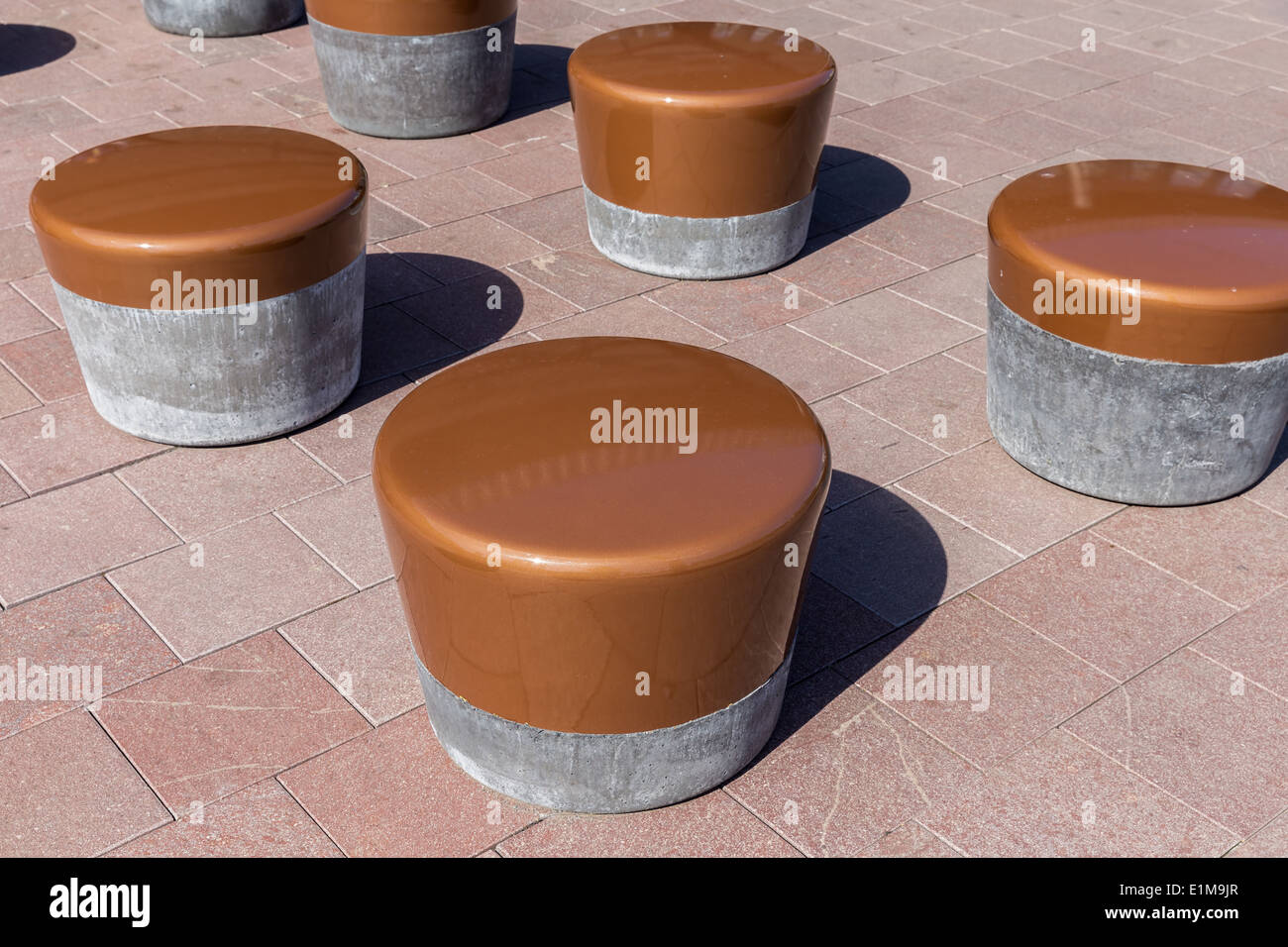 Modern circular stone seats at a Dutch square Stock Photo - Alamy