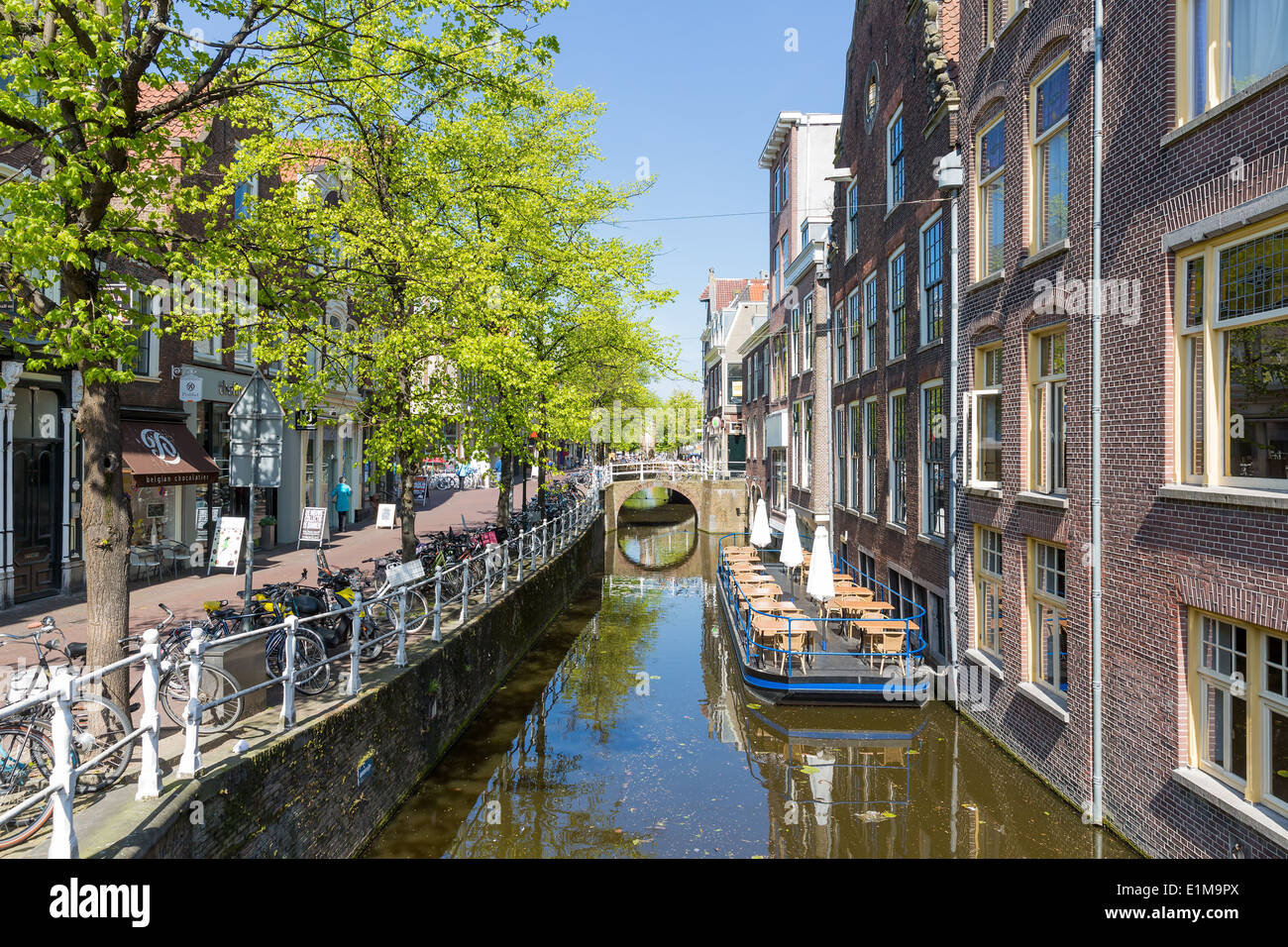 DELFT, THE NETHERLANDS - APRIL 16:Townscape with unknown pedestrian ...