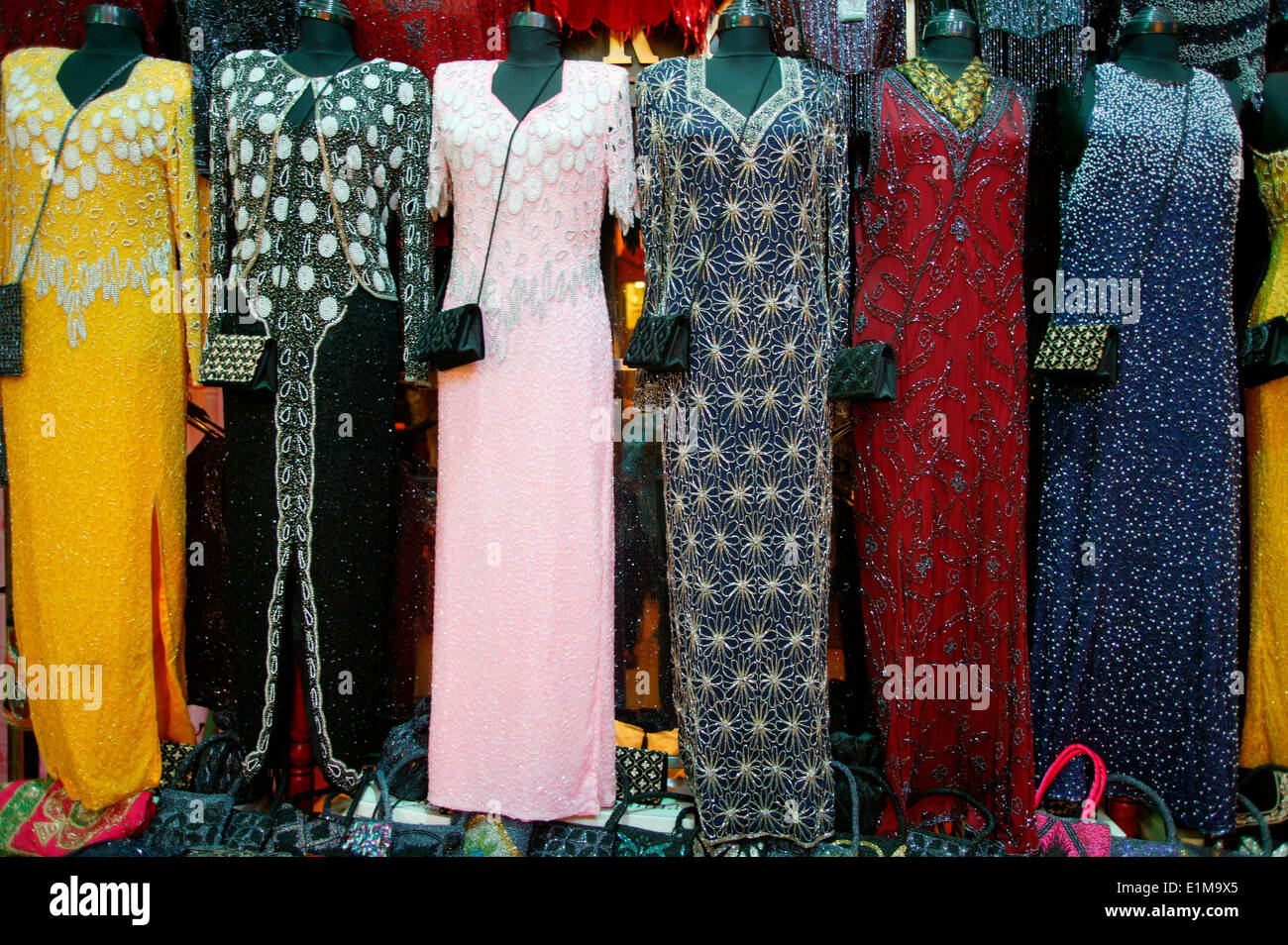 Dresses in a bazar shop Stock Photo - Alamy