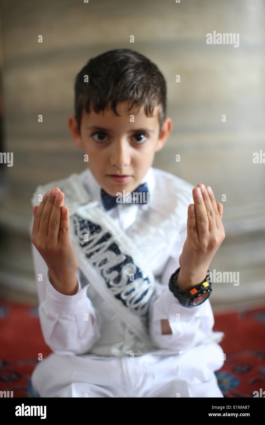 EyŸp Mosque. Boy wearing the traditional costume for the circumcision ...