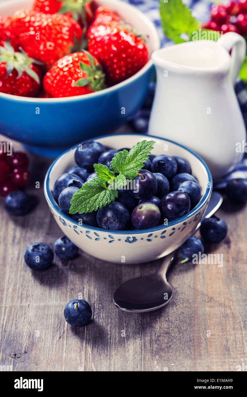 Strawberries blueberries in wooden hi-res stock photography and images ...