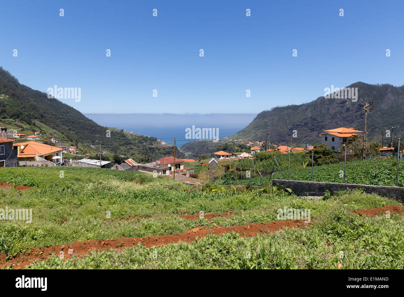 Landscape of Madeira with mountains, houses and agriculture Stock Photo ...