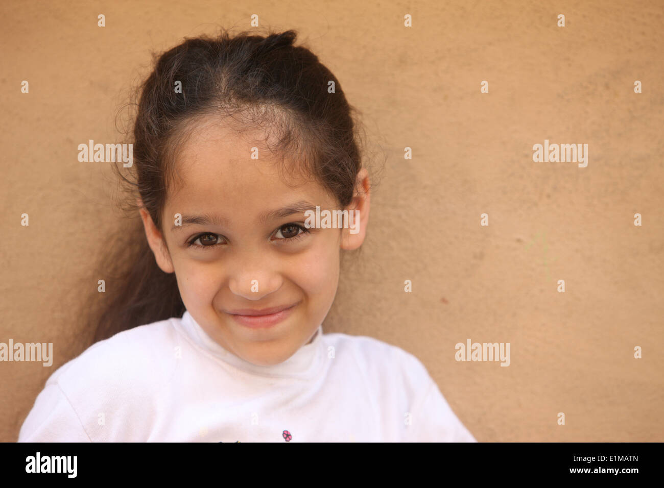 Young Turkish girl smiling Stock Photo - Alamy