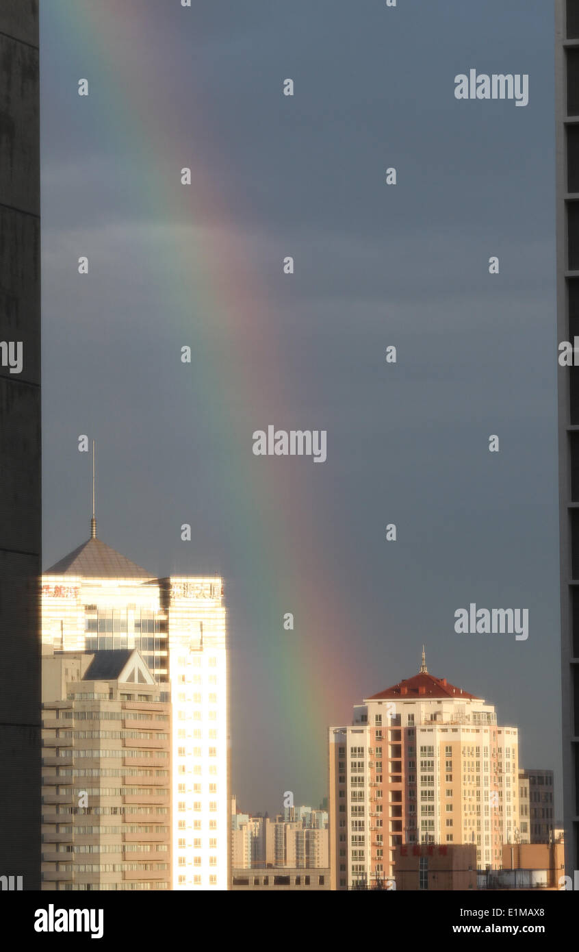 Beijing, China. 6th June, 2014. Rainbow appears after hours of ...