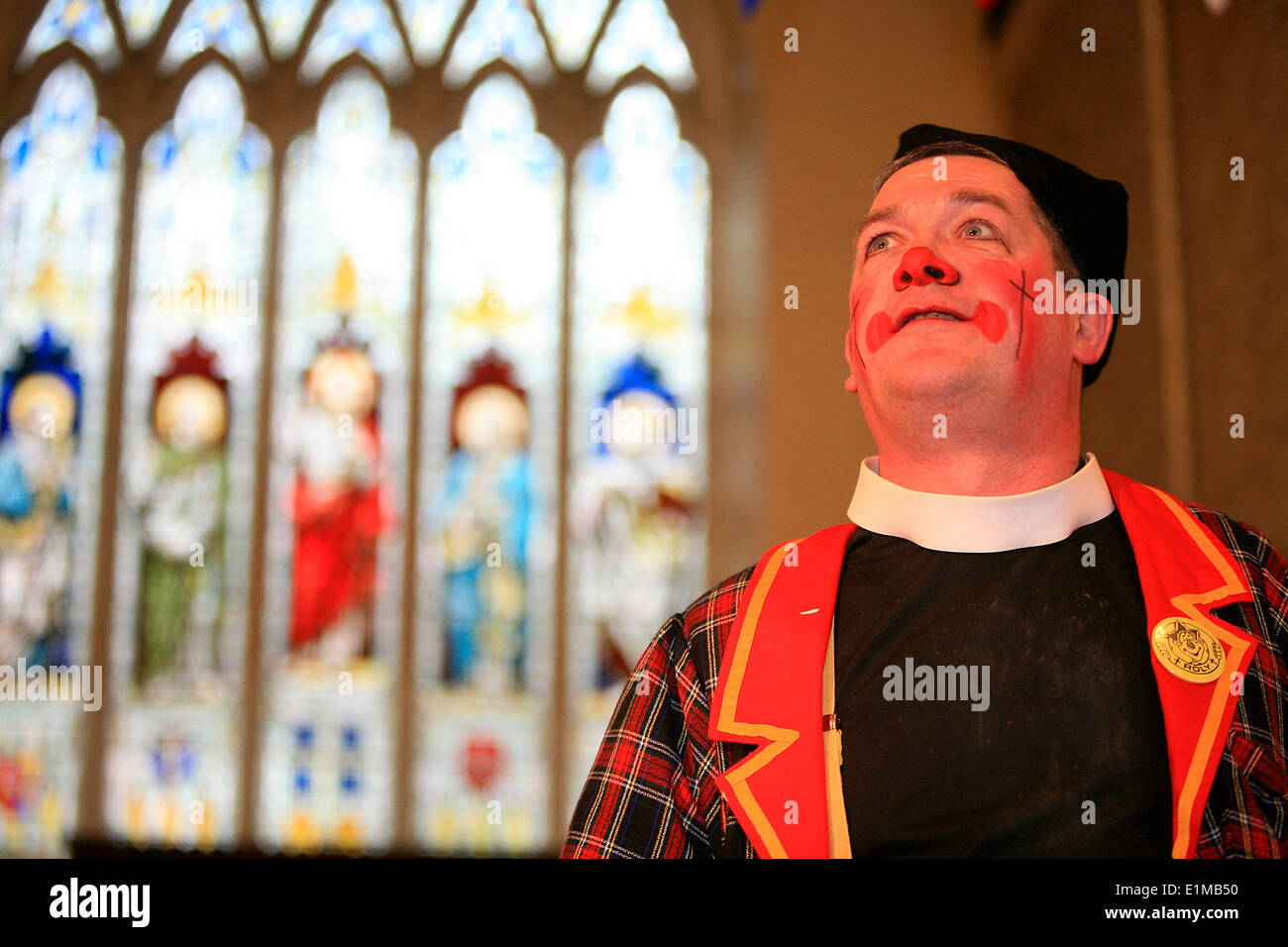 Praying clown hi-res stock photography and images - Alamy