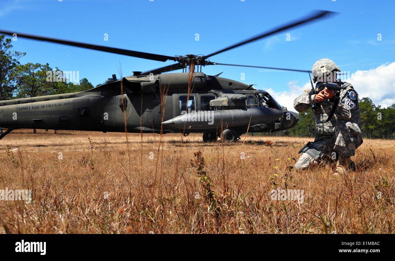 U.S. Army Staff Sgt. Hector Caraballo, with the Joint Task Force-Bravo ...