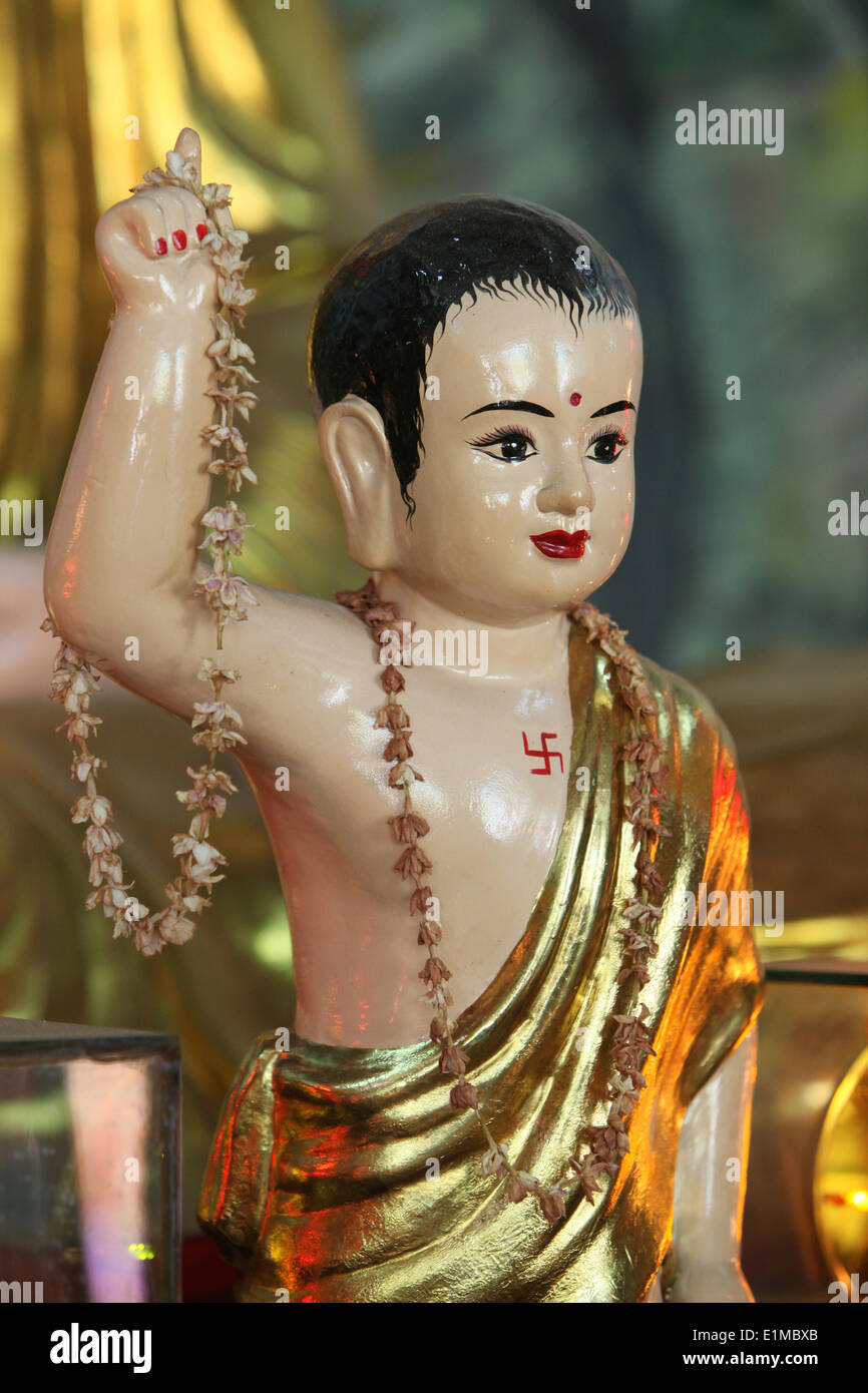 Child Buddha statue in Quoc Tu pagoda Stock Photo - Alamy