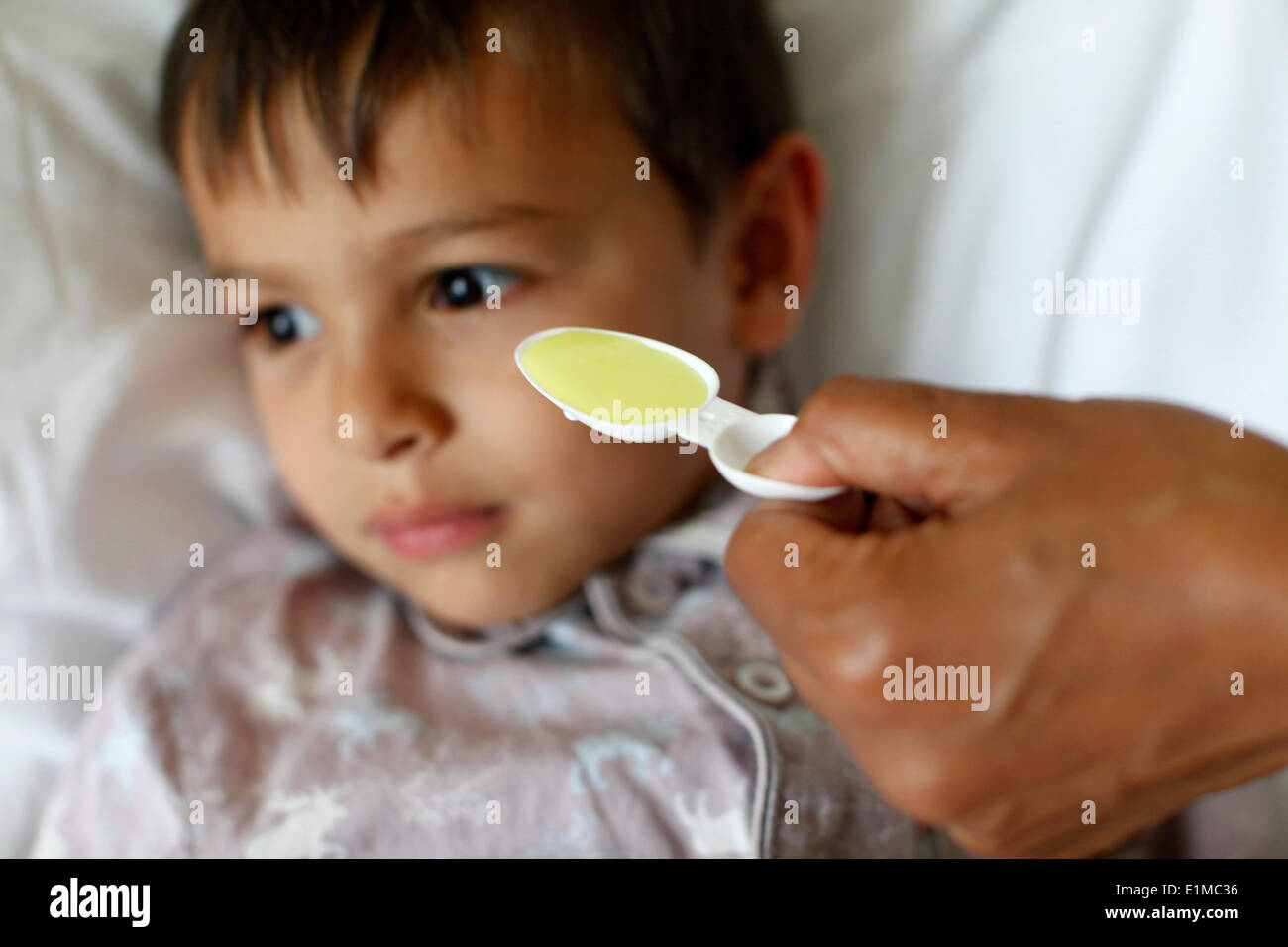 Boy refusing to take medicine Stock Photo - Alamy