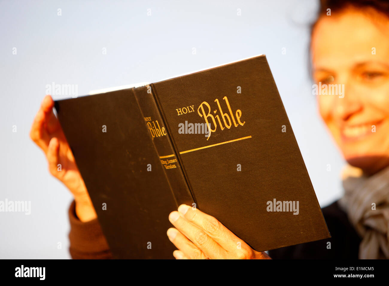 Woman reading the Bible Stock Photo - Alamy