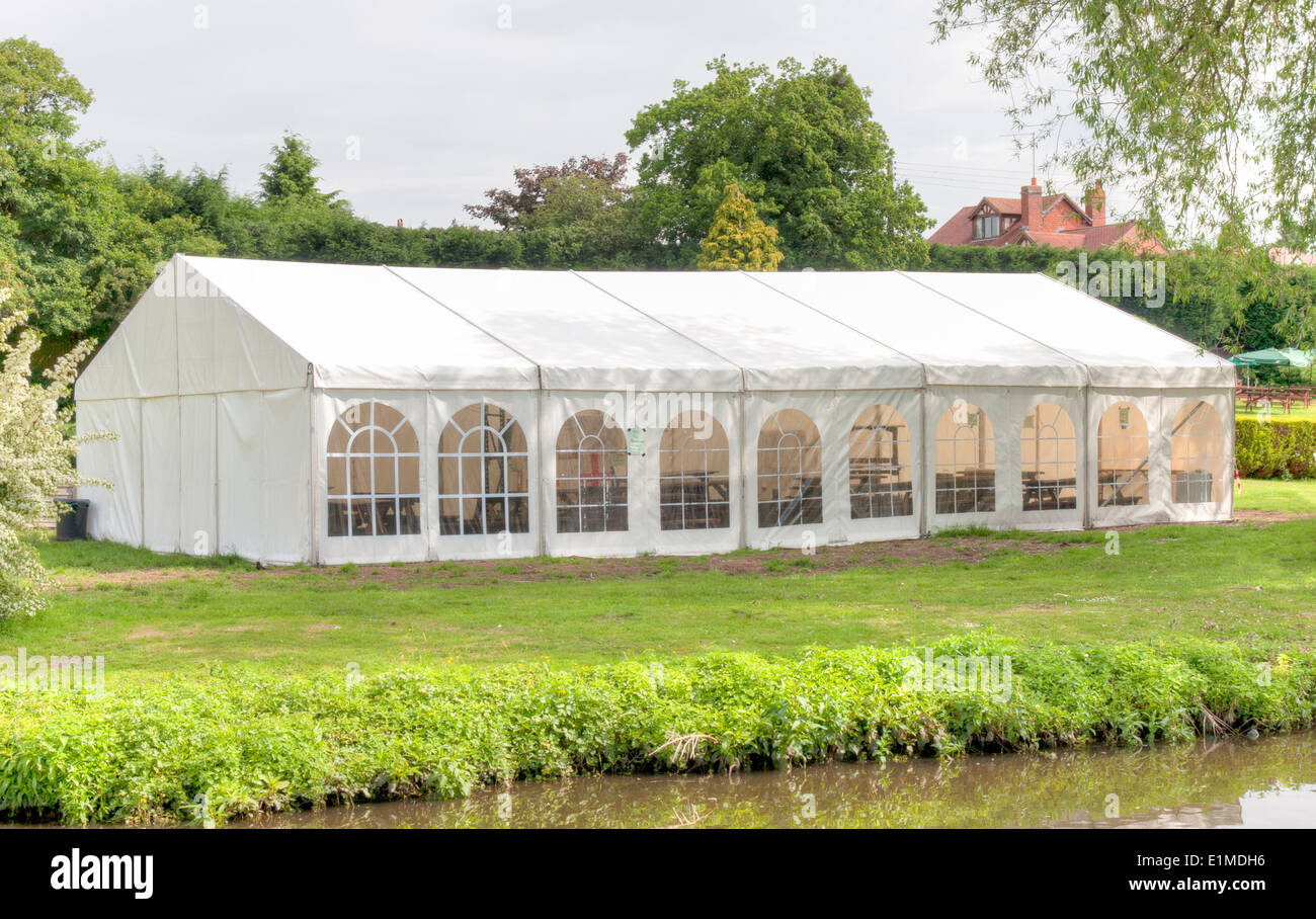 Large marquee tent in the grounds of a pub ready for a wedding Stock ...