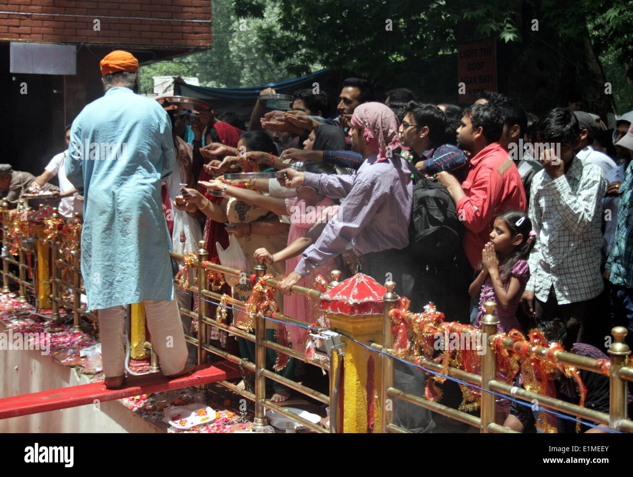 Srinagar, Kashmir. 6th June, 2014. A Kashmiri Hindu devotee prays at ...