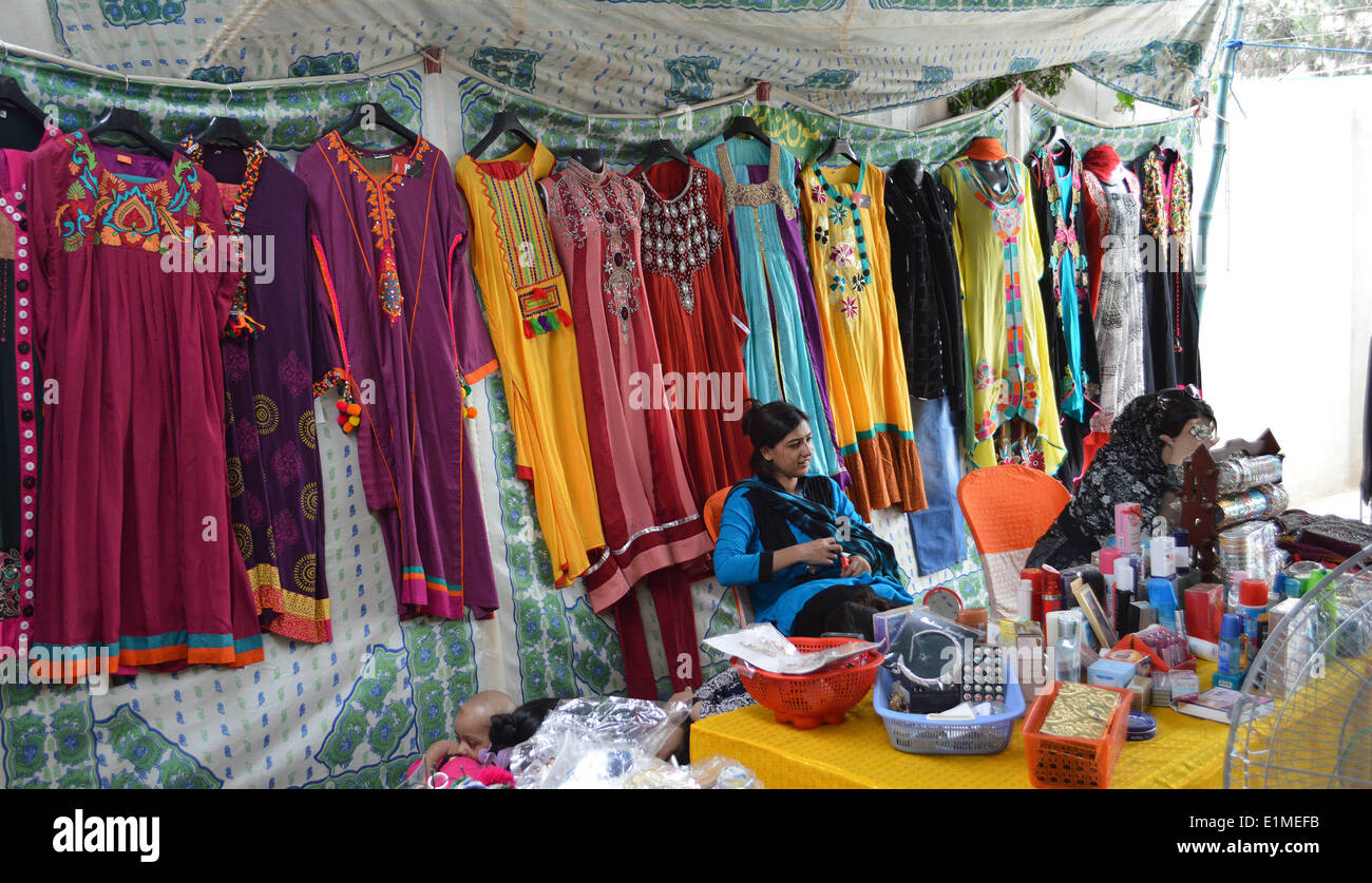 Quetta. 6th June, 2014. Traditional baluchi dresses are seen at a stall ...