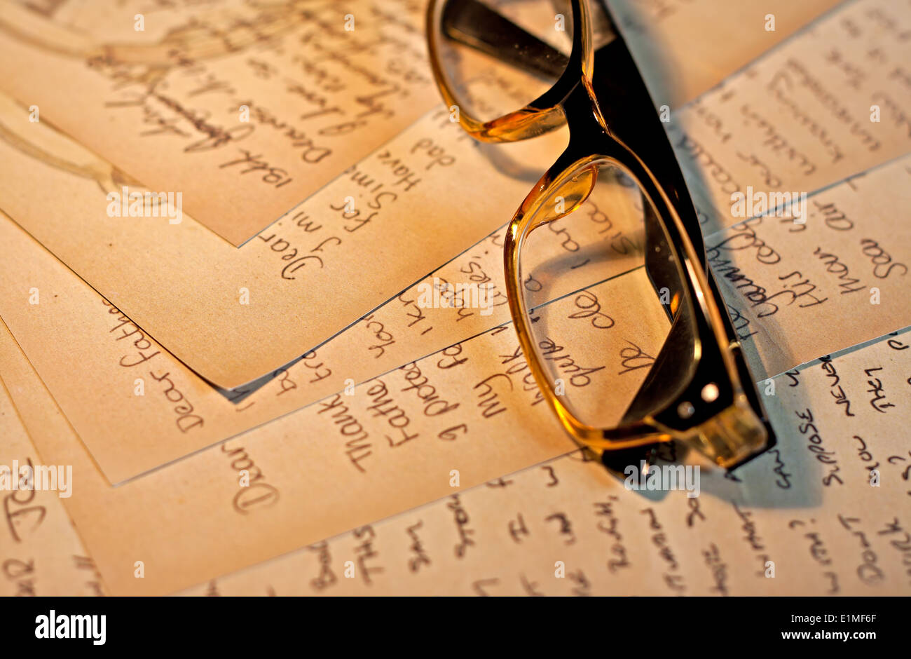 Old stained letter and spectacles Stock Photo - Alamy