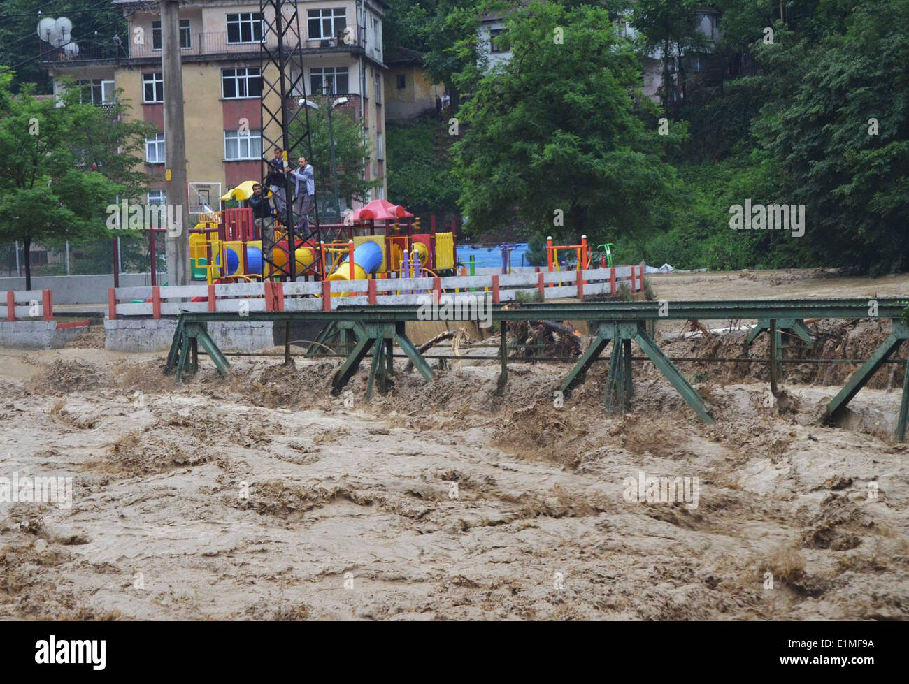 Istanbul. 6th June, 2014. Three men are besieged on an iron tower by ...