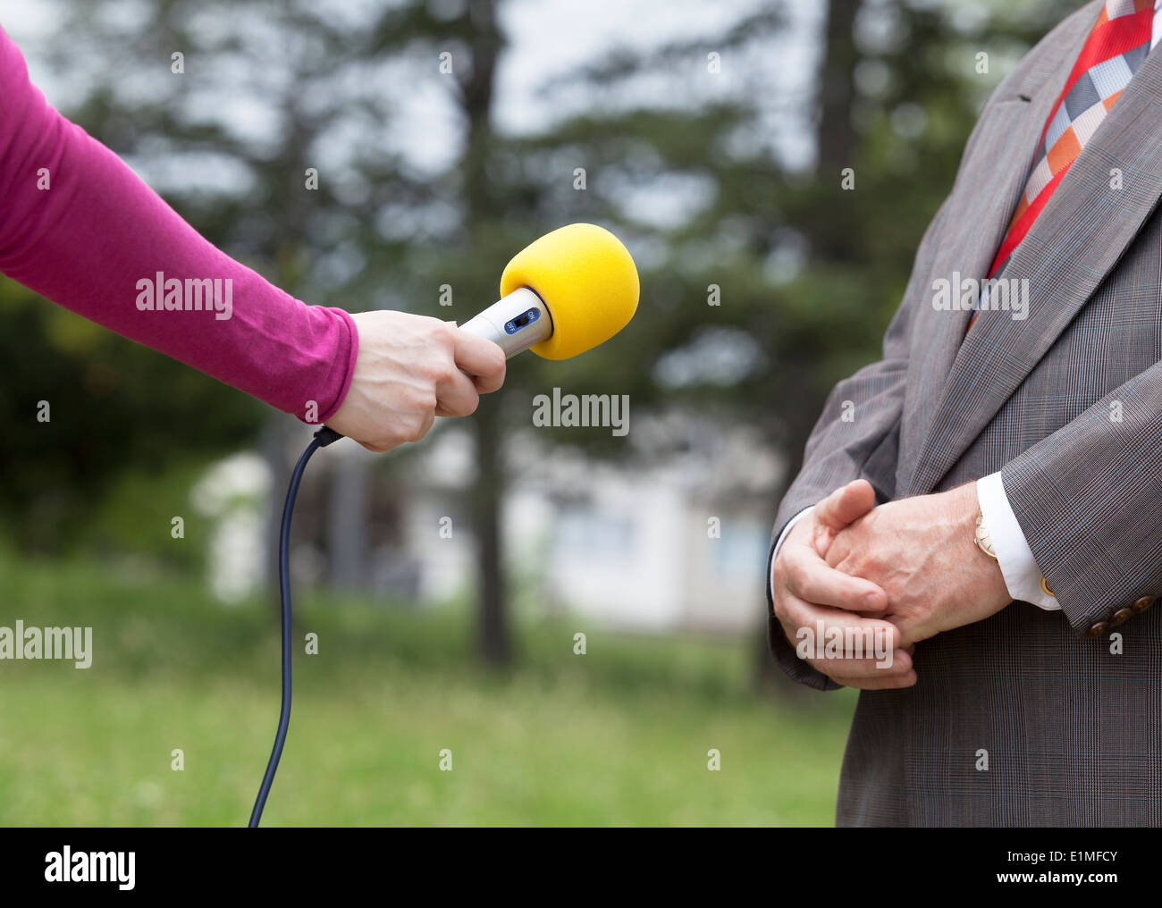 media interview with the microphone Stock Photo - Alamy