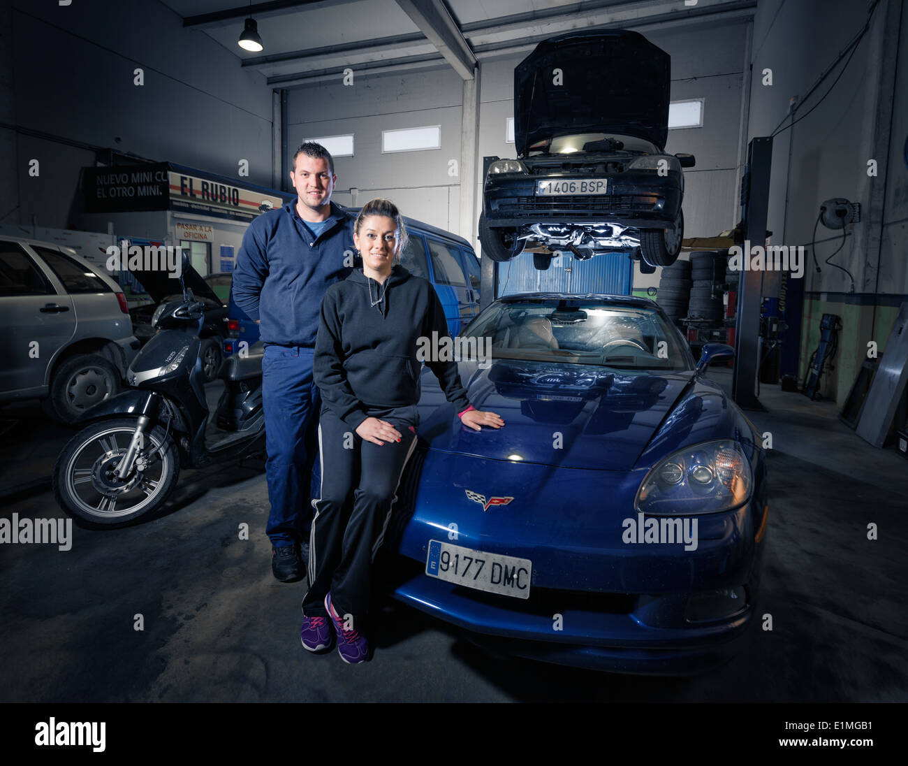 Mechanic and girlfriend Stock Photo - Alamy