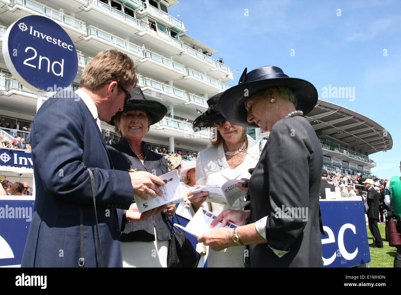 Epsom Downs, Surrey, UK. 06th June, 2014. Lady Cobham (centre in dark ...