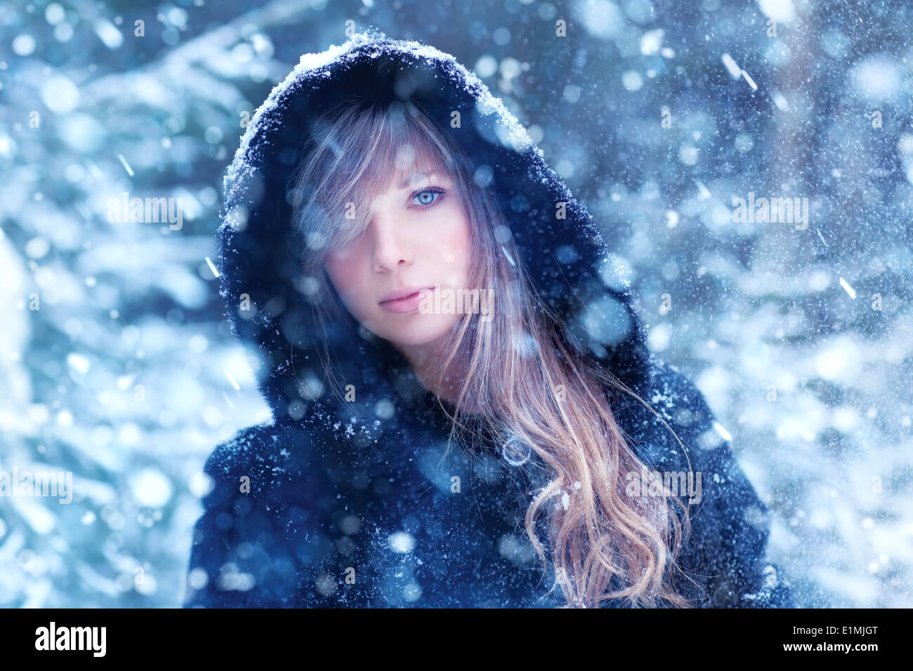 Snow falling woman face hi-res stock photography and images - Alamy