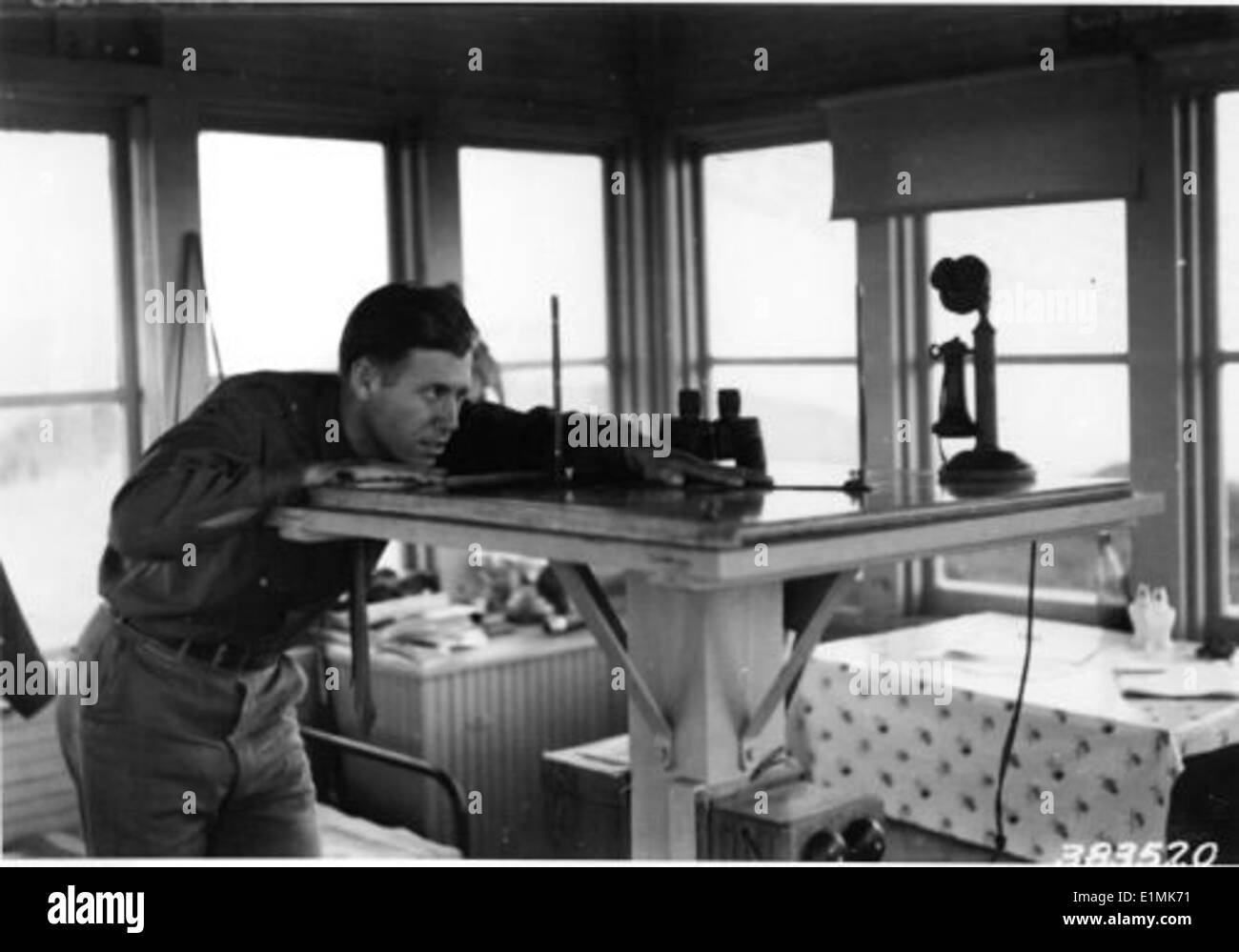 A black-and-white photograph of Capillo Peak, showcasing its rugged ...