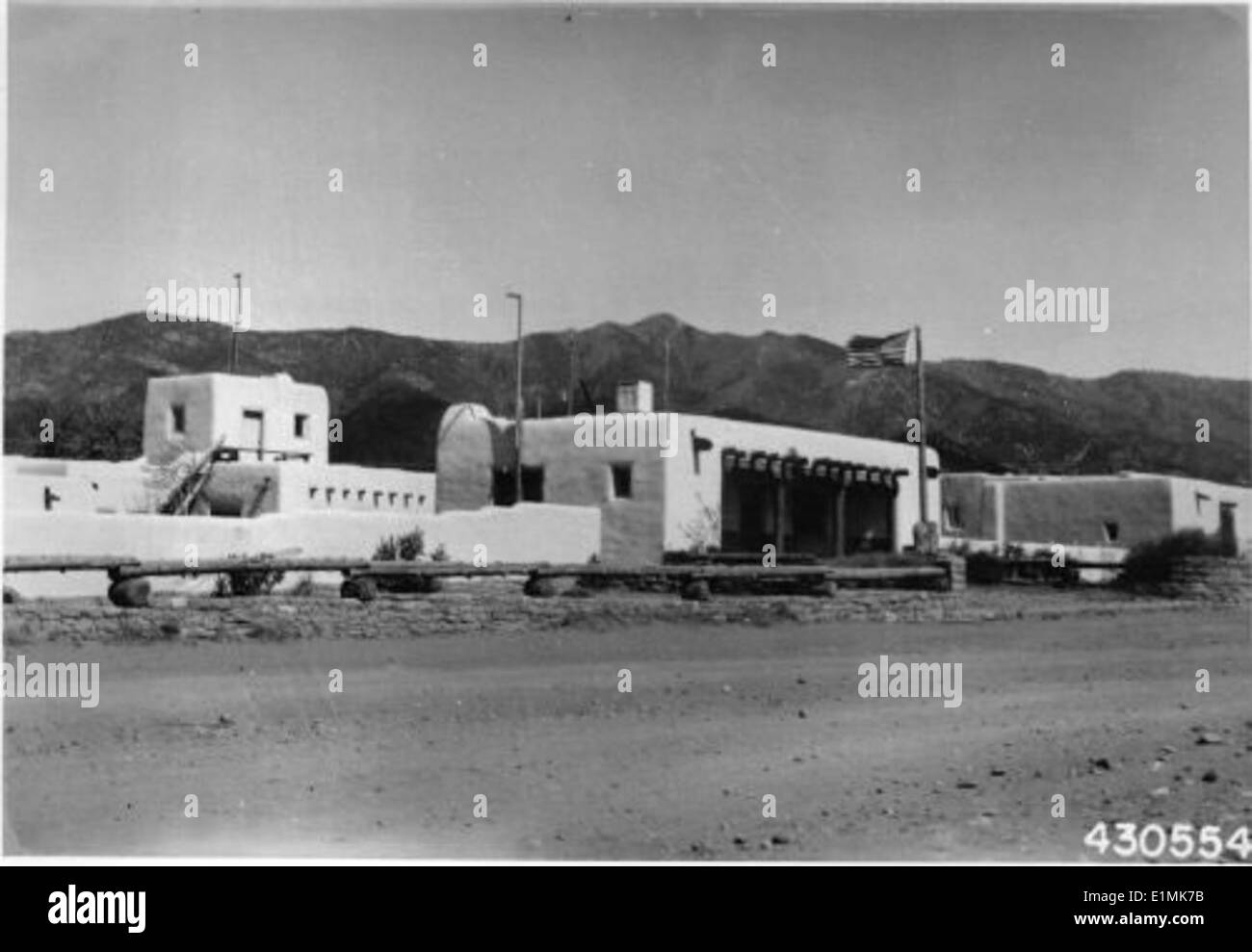 A black-and-white image showing the historic ranger station in ...