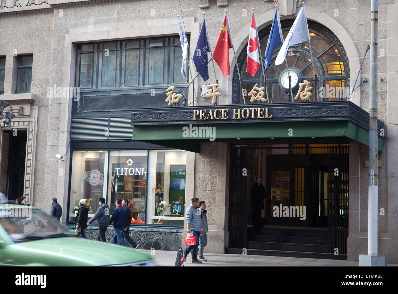 The Entrance of the Peace Hotel on the Nanjing Road in Shanghai, China ...