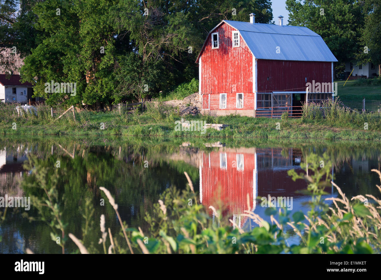 Red Barn on Wisconsin Lake Stock Photo - Alamy