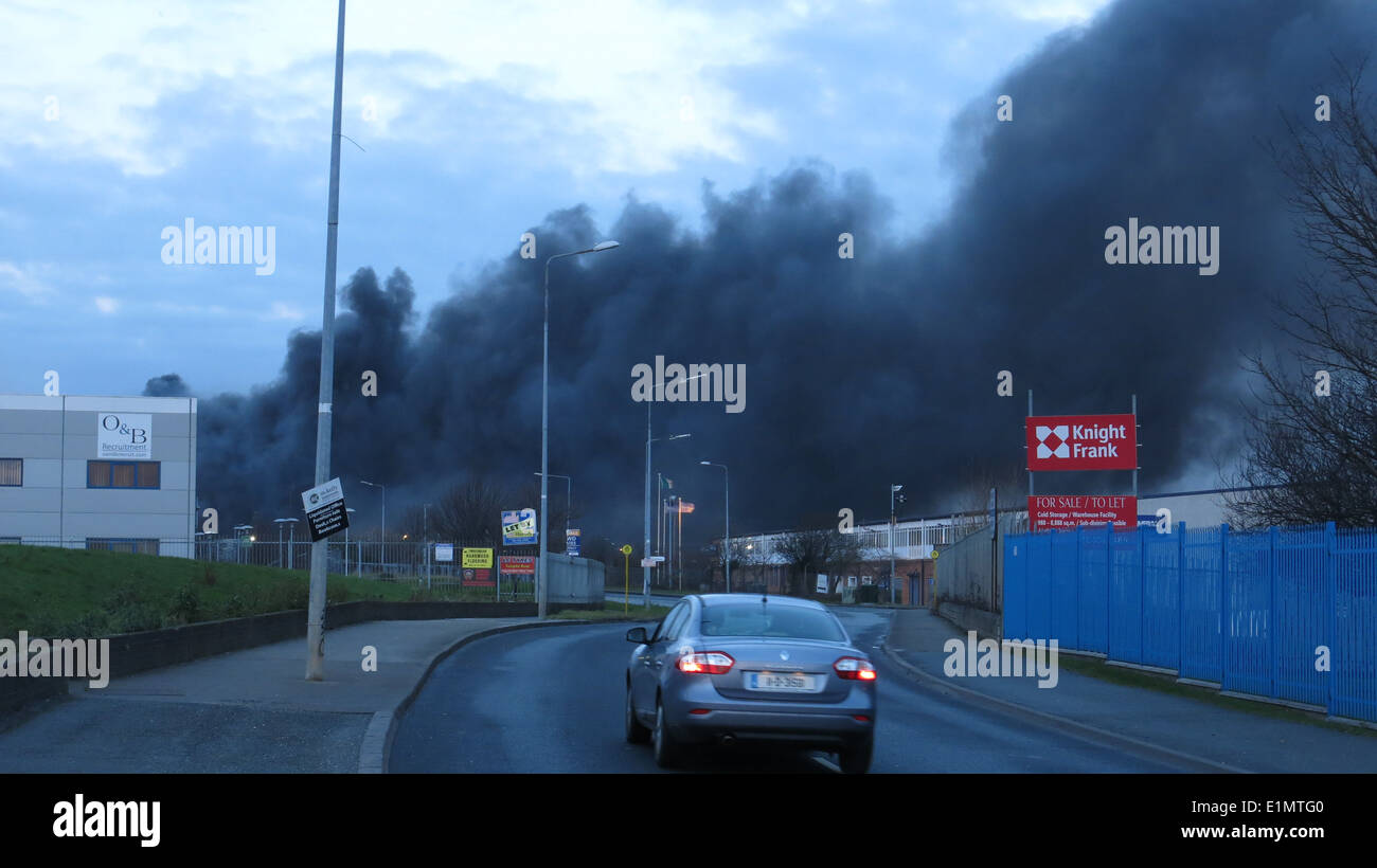 A huge cloud of black smoke in the air during a major fire at the ...