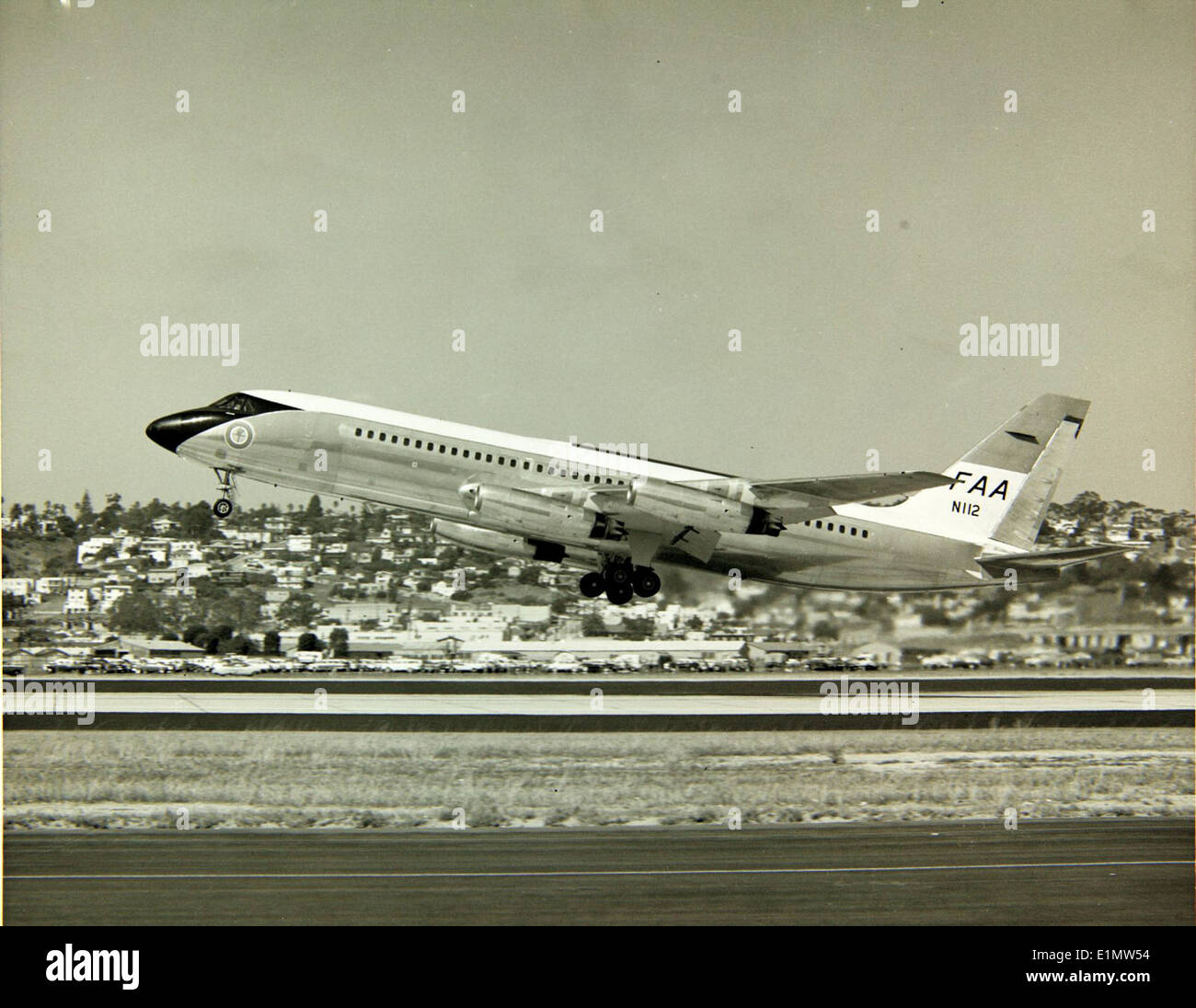 The Convair 880, captured in this photo, was a twin-engine, quadjet ...