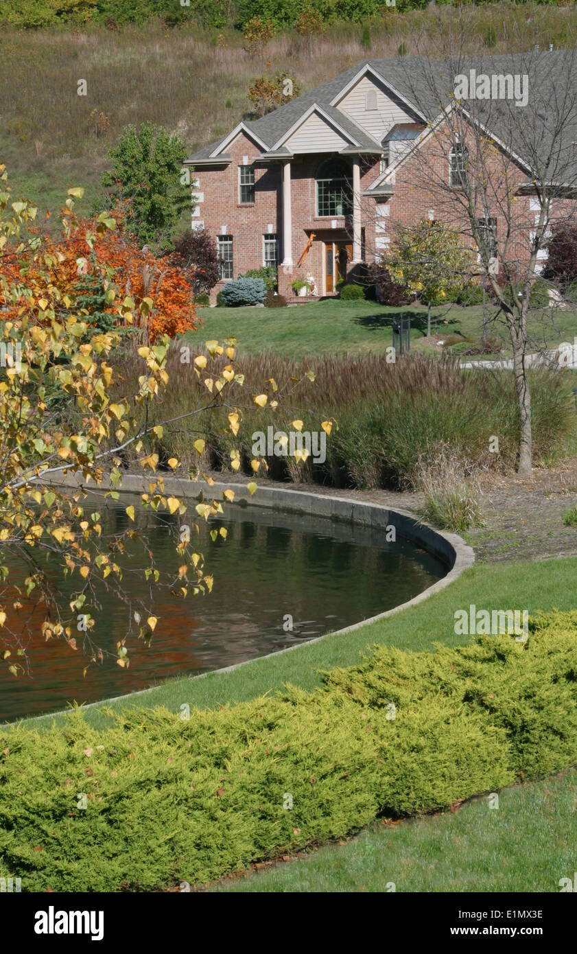 Home with Pond Stock Photo - Alamy