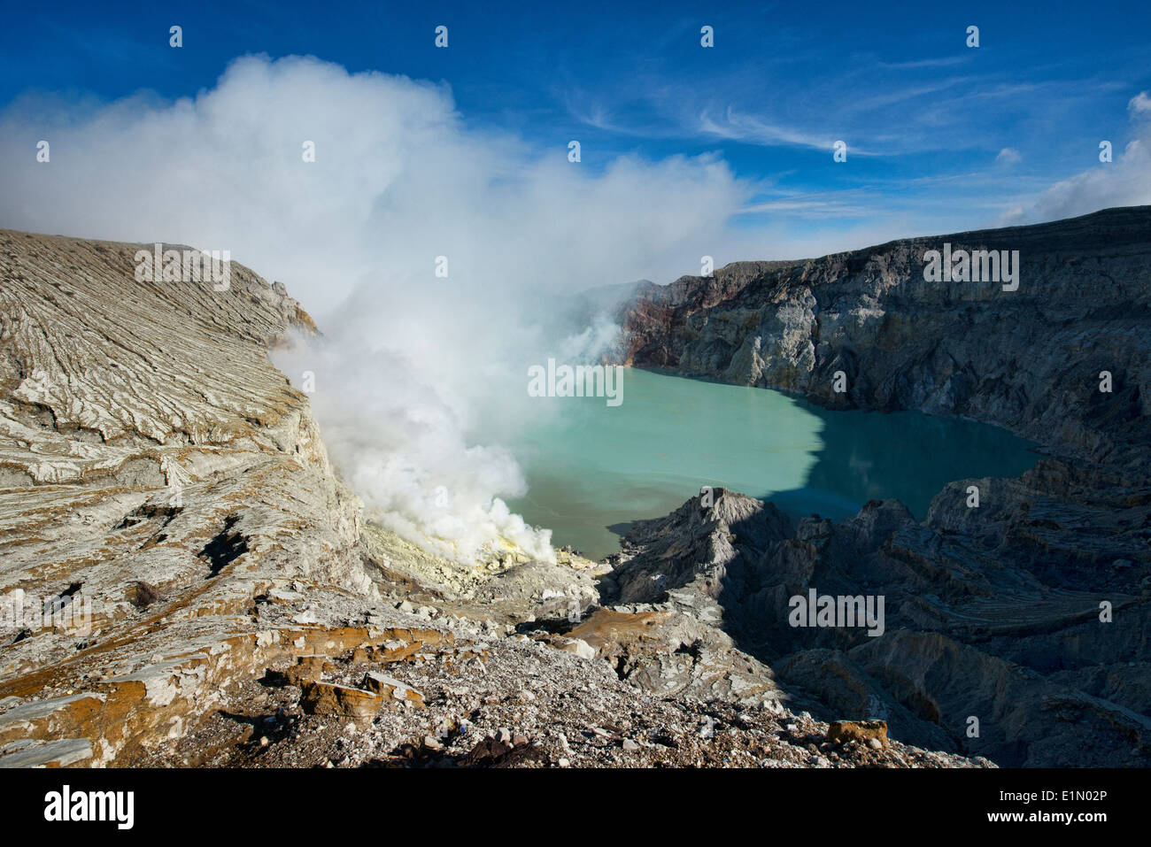 view of the smoking Kawah Ijen volcanic crater and lake, Java ...