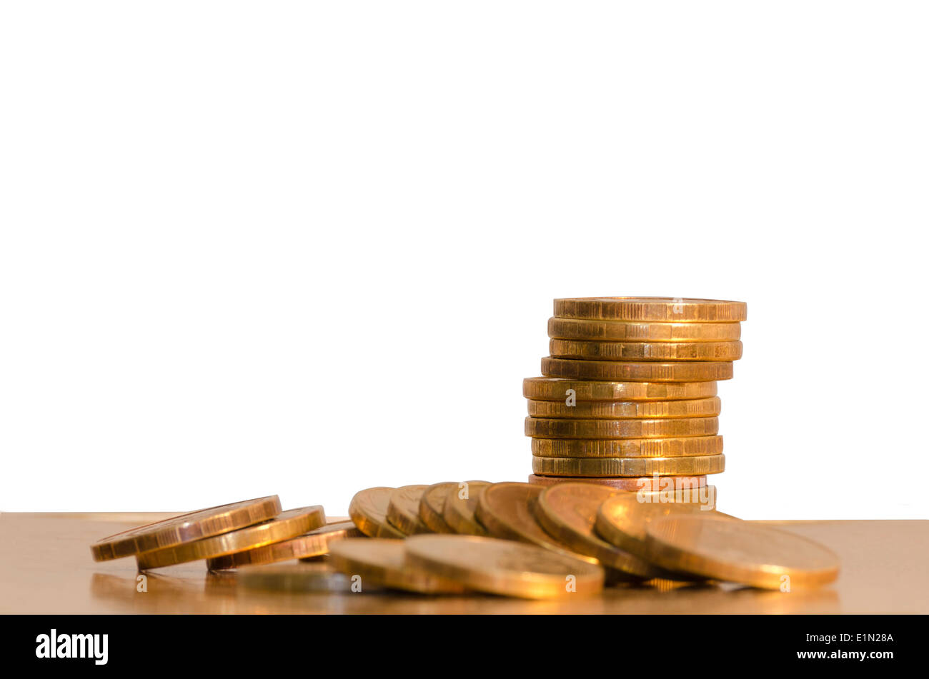 Coins scattered and located in a pile on white background Stock Photo ...