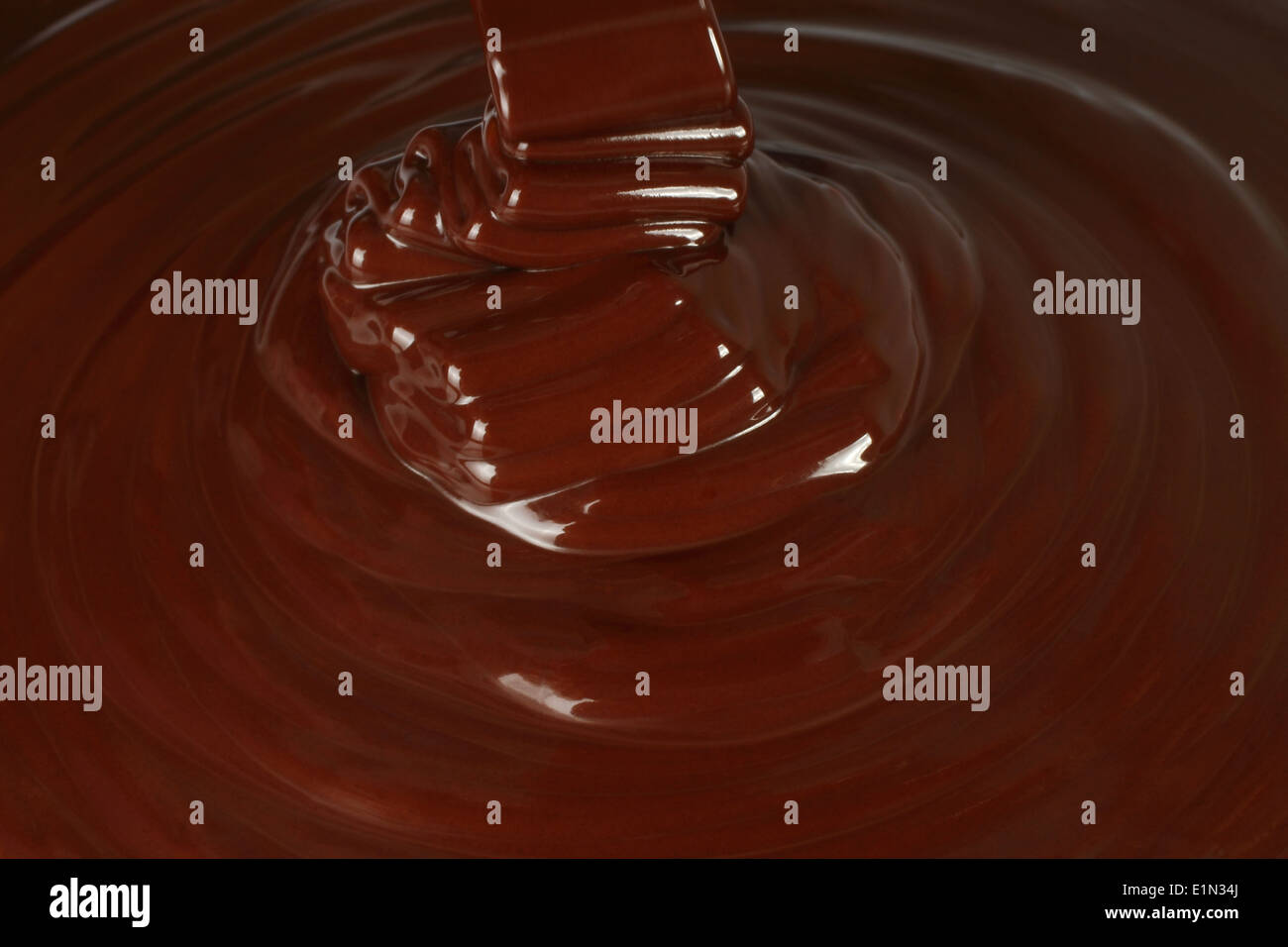 Chocolate flow background Stock Photo - Alamy