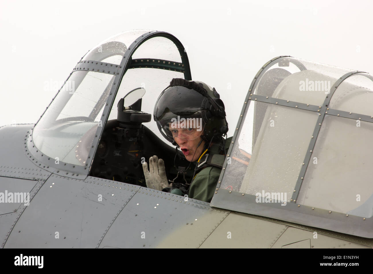A pilot of a Grumman Hellcat readying for take off at the Duxford Air ...