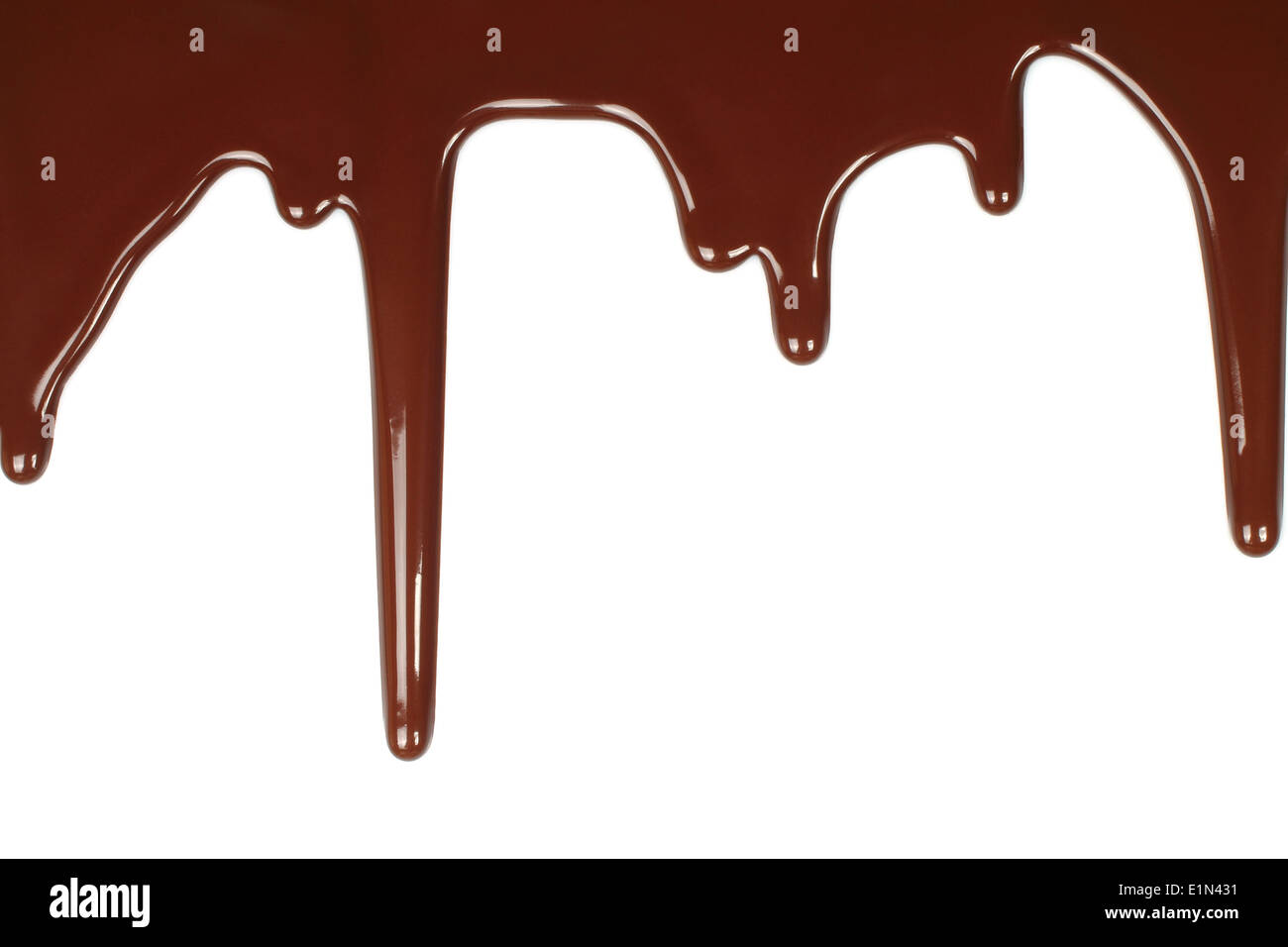 Melted chocolate dripping on white background Stock Photo - Alamy
