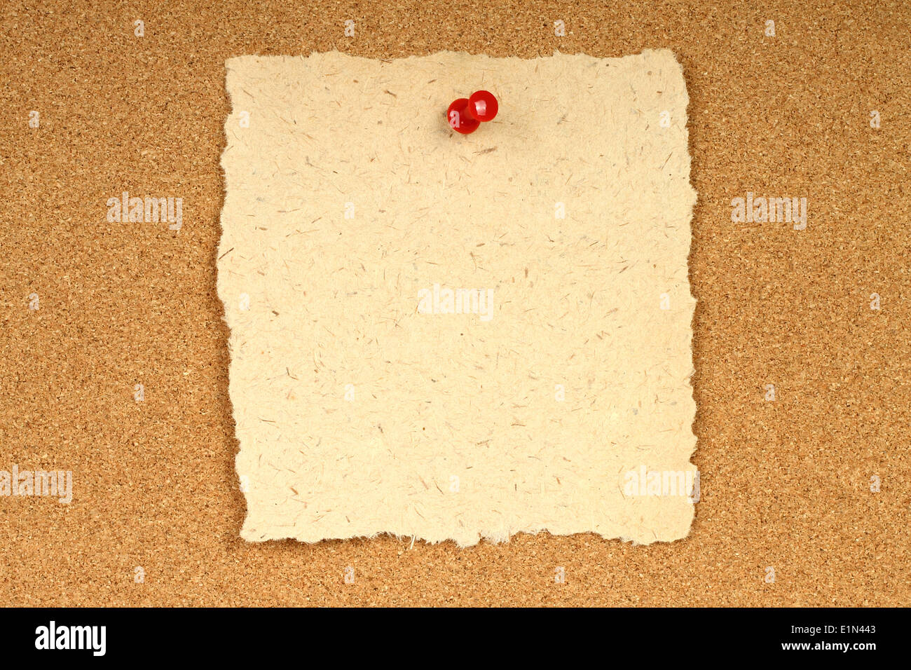 Old paper with pin on wooden background Stock Photo - Alamy