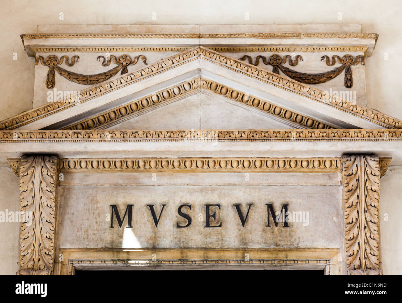 Entrance of an ancient museum, letters on original marble Stock Photo ...