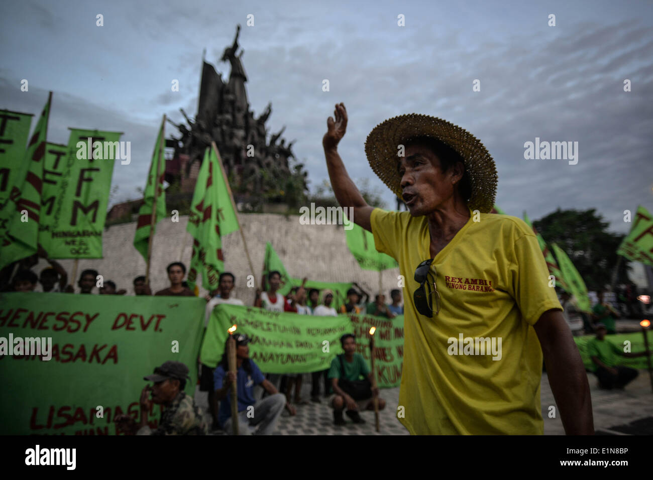 Quezon, Philippines. 7th June, 2014. Farmers shout slogans during a ...