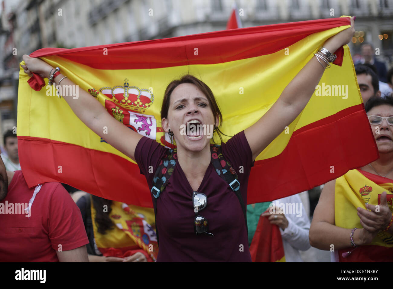 Madrid, Spain. 6th June, 2014. A protestor shouts slogans and waves ...