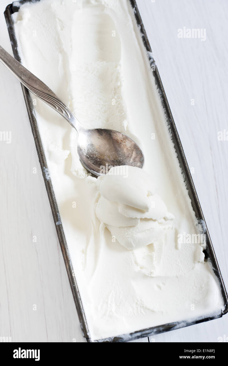 Homemade vanila ice cream in frozen metalic container Stock Photo - Alamy