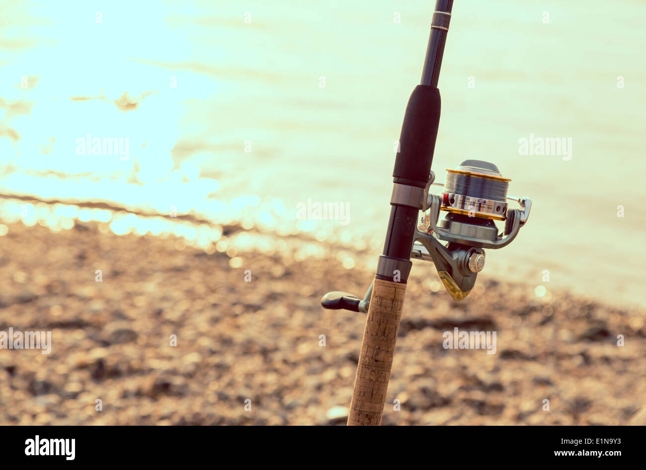 Fishing rod, and reel Stock Photo - Alamy